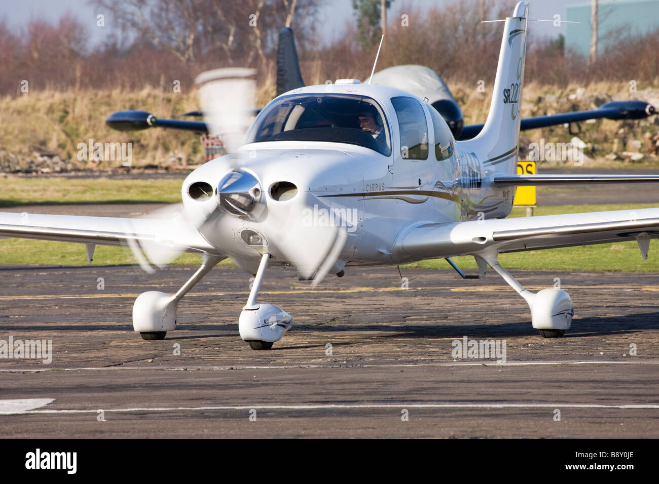 Cirrus SR22 G-TAAB taxiing to runway to commence take-off run at ...