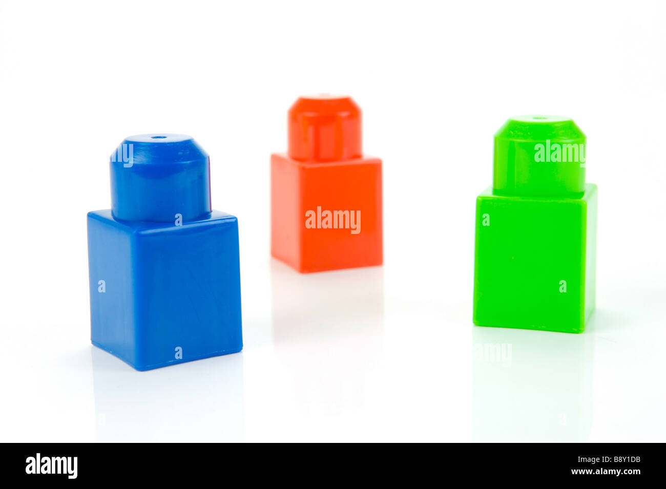 Building blocks isolated against a white background Stock Photo - Alamy