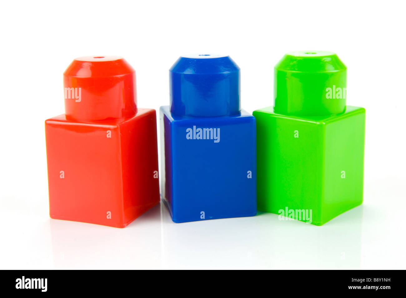 Building blocks isolated against a white background Stock Photo - Alamy