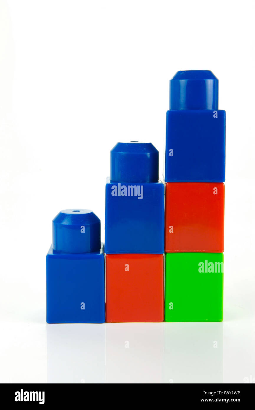 Building blocks isolated against a white background Stock Photo - Alamy