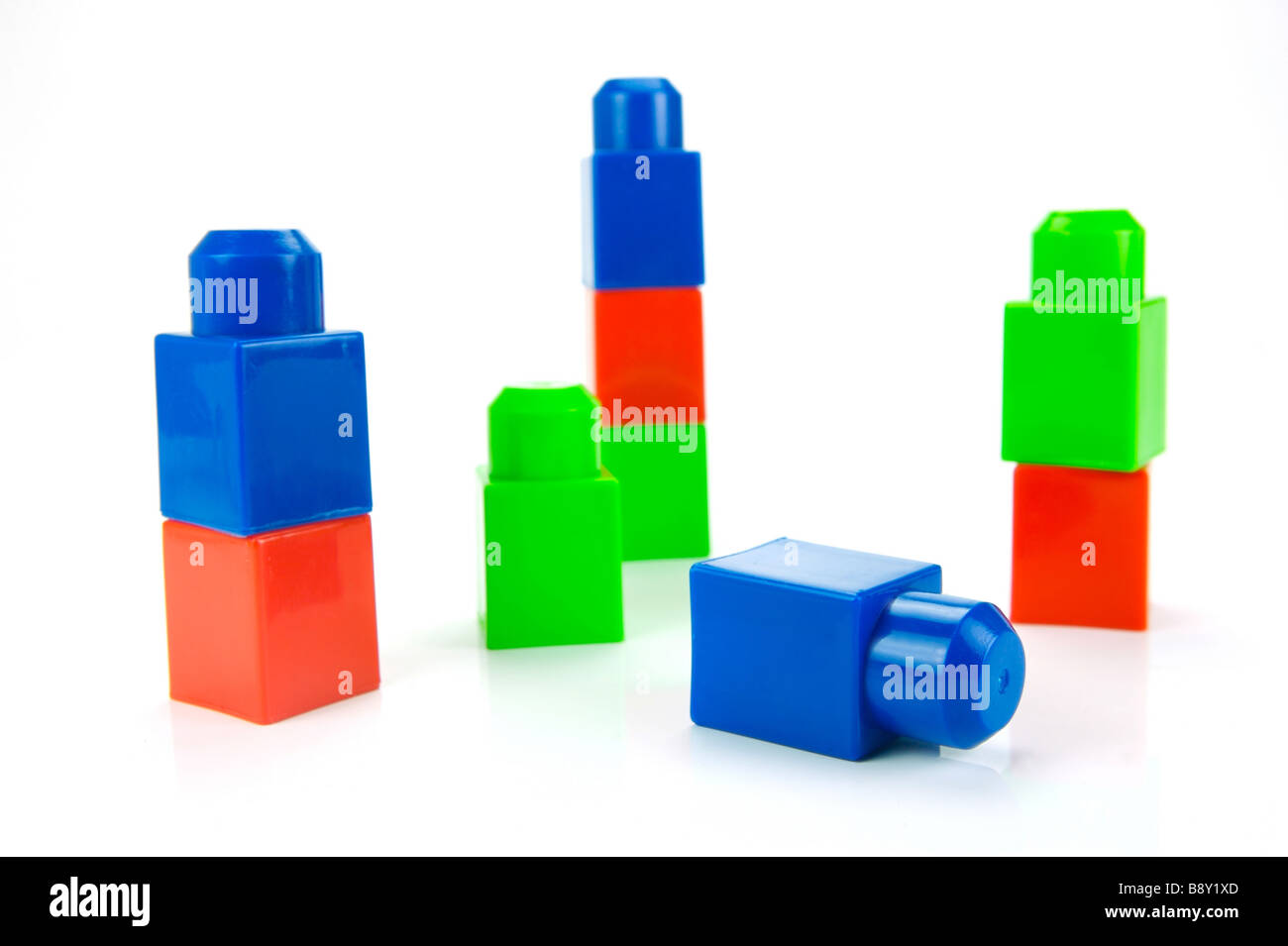 Building blocks isolated against a white background Stock Photo - Alamy