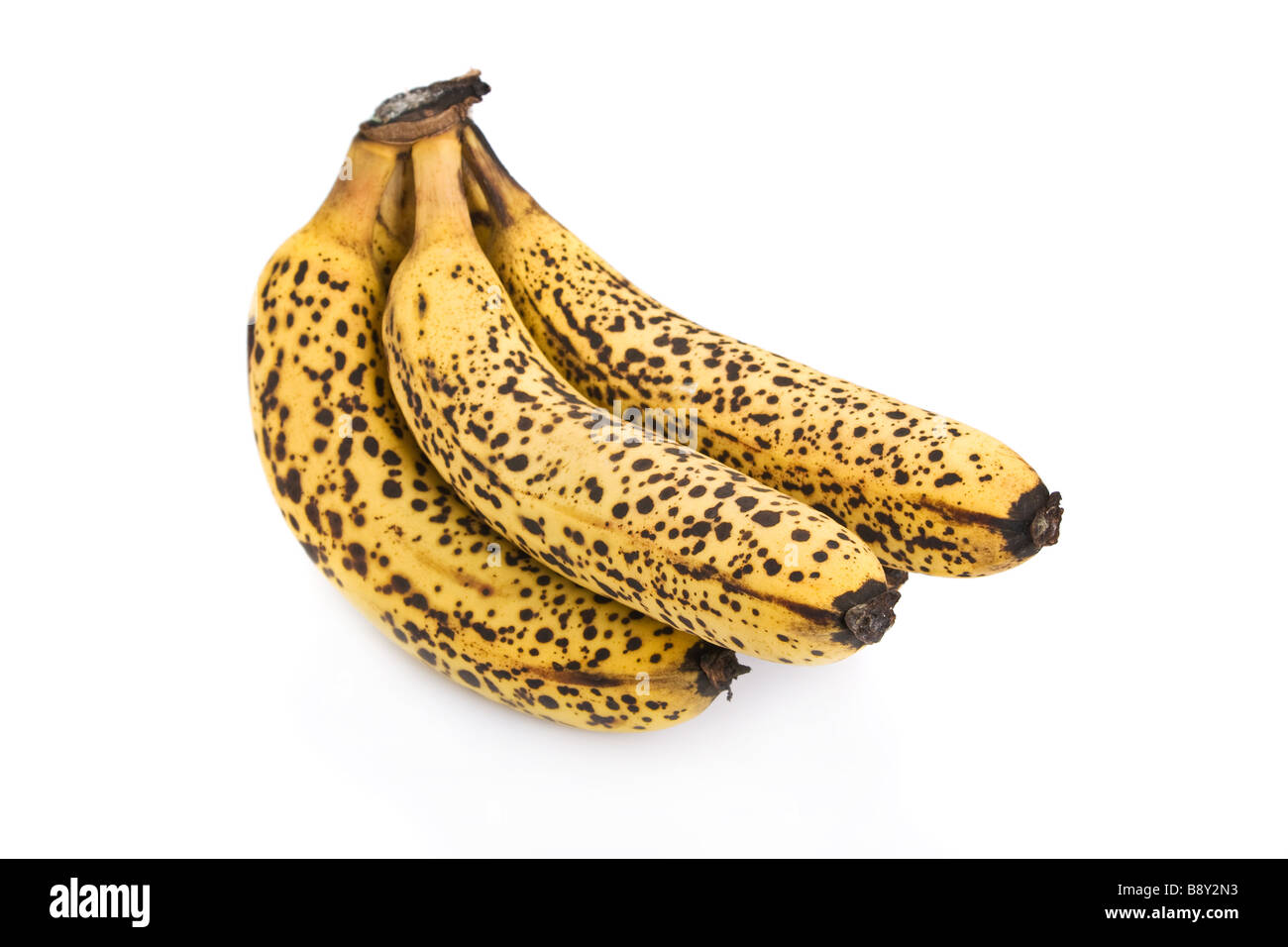 Cluster of over ripe bananas isolated on white background Stock Photo ...