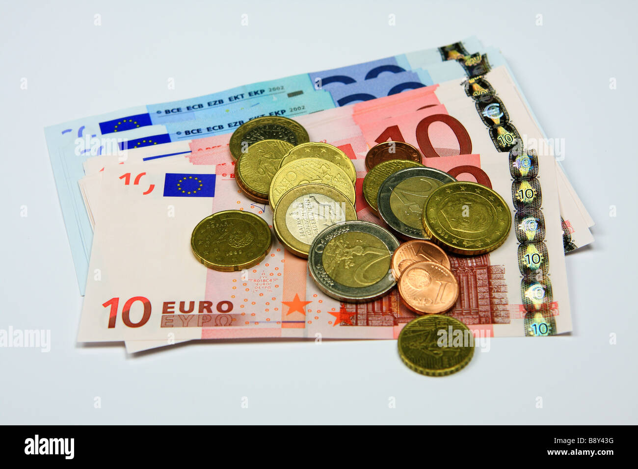 euro notes and coin Stock Photo - Alamy