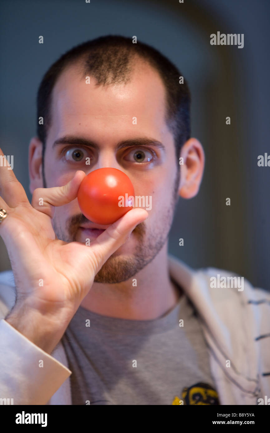 Red Nose tomato nose Stock Photo - Alamy