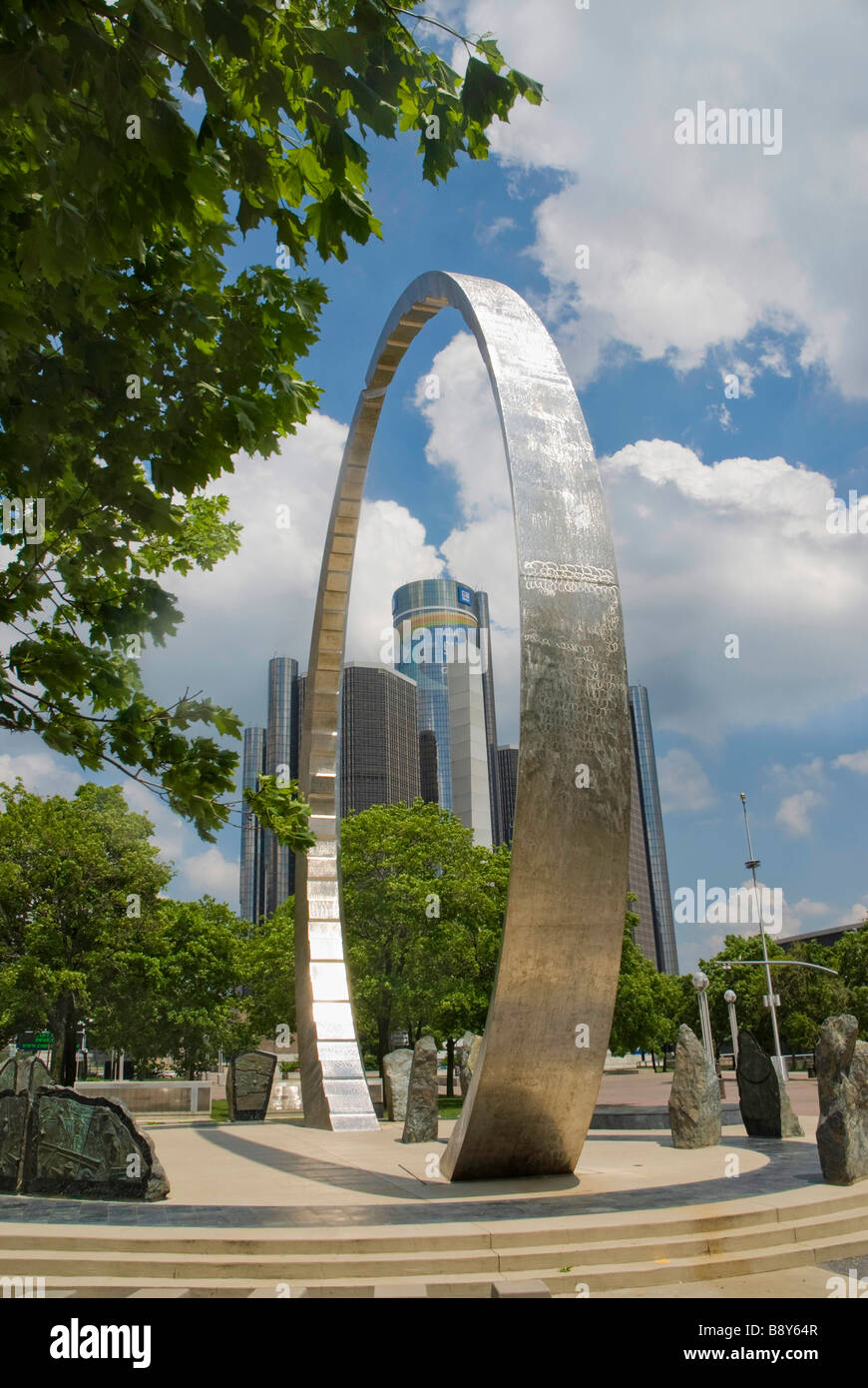 Arch sculpture with buildings in the background, Renaissance Center ...
