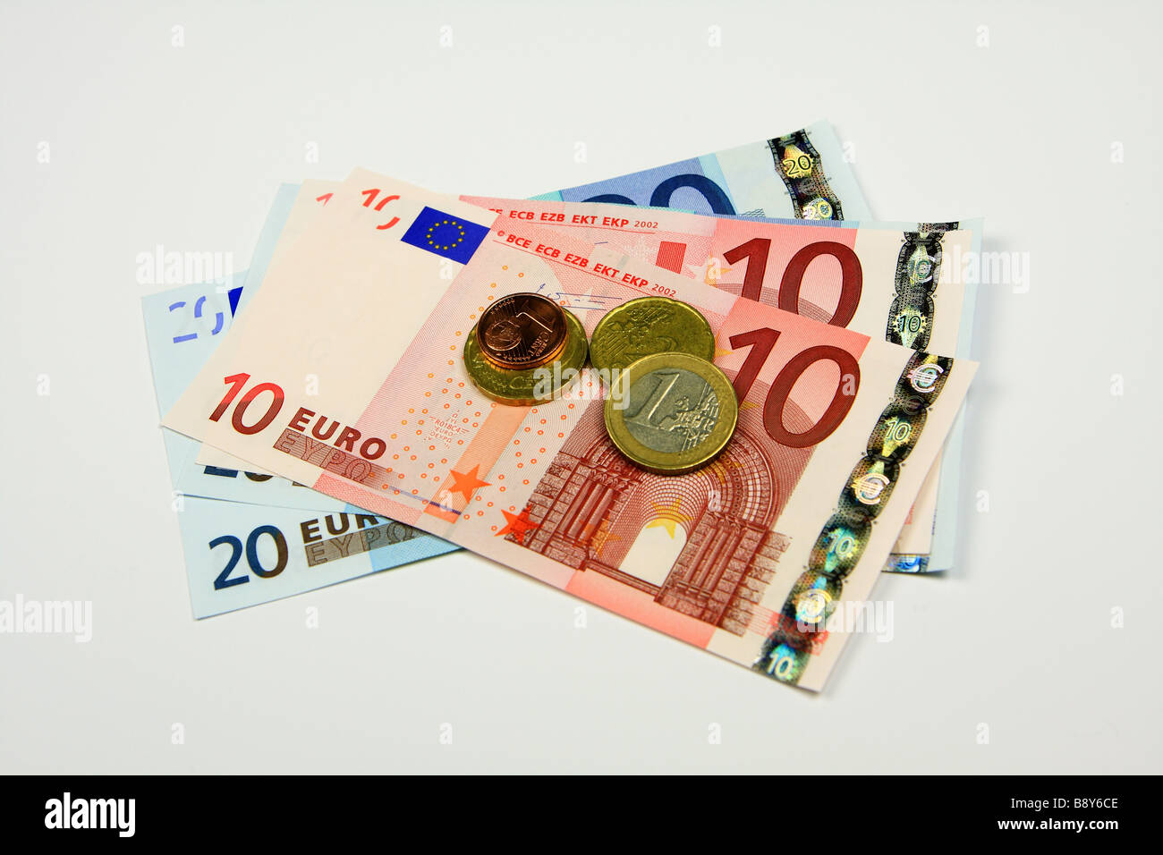 euro notes and coin Stock Photo - Alamy