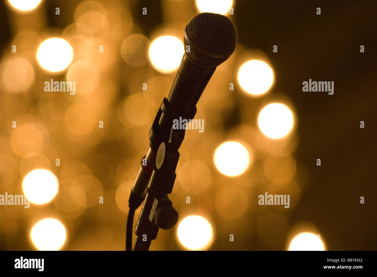 microphone in front of lights Stock Photo - Alamy