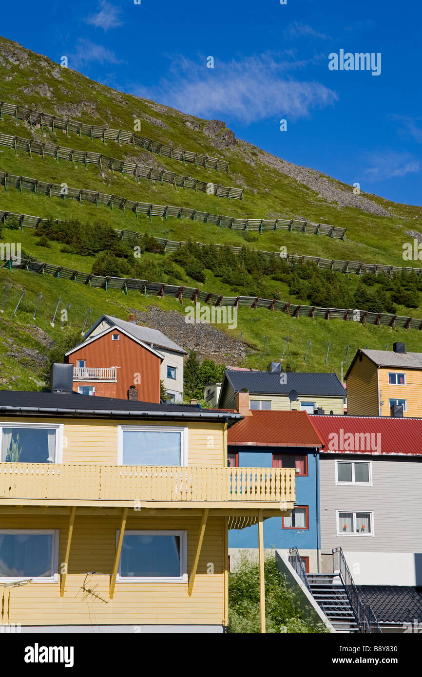 Low angle view houses with terraced fields in background Honningsvag ...