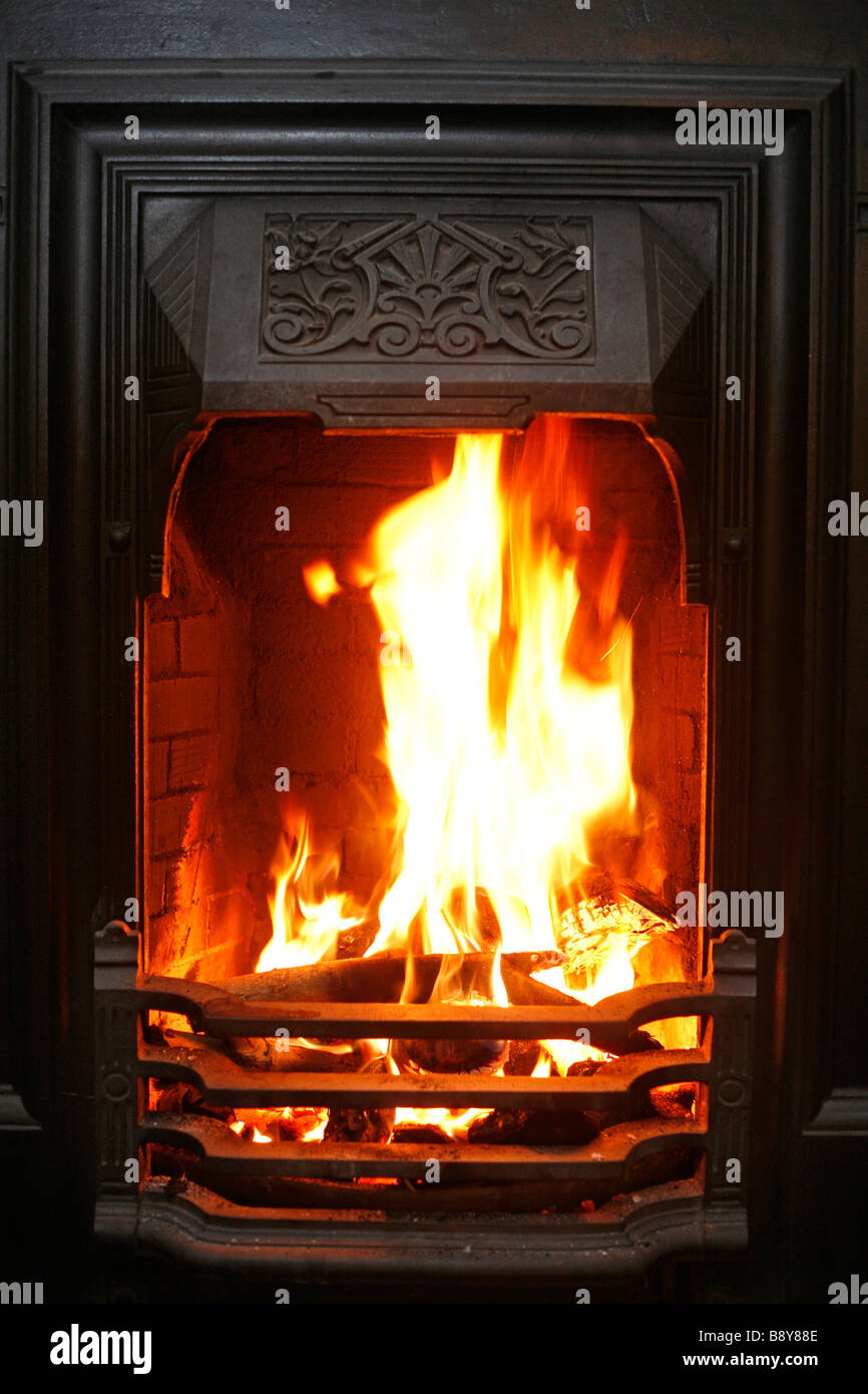 Flames leap from an open fire burning coal and wood Stock Photo - Alamy