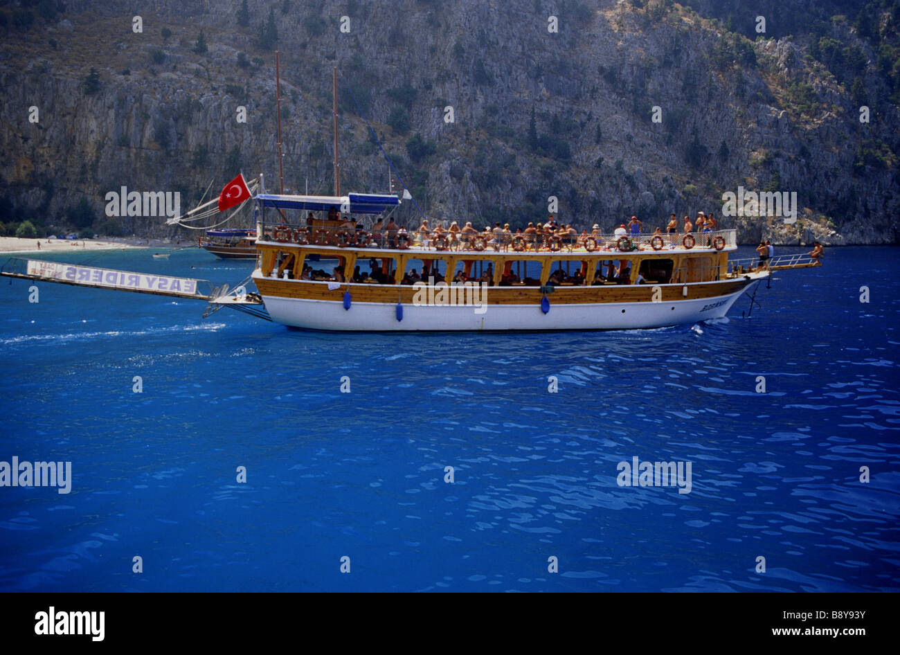 turist turkish boat at butterfly valley (Kelebek Vadisi) in oludeniz ...