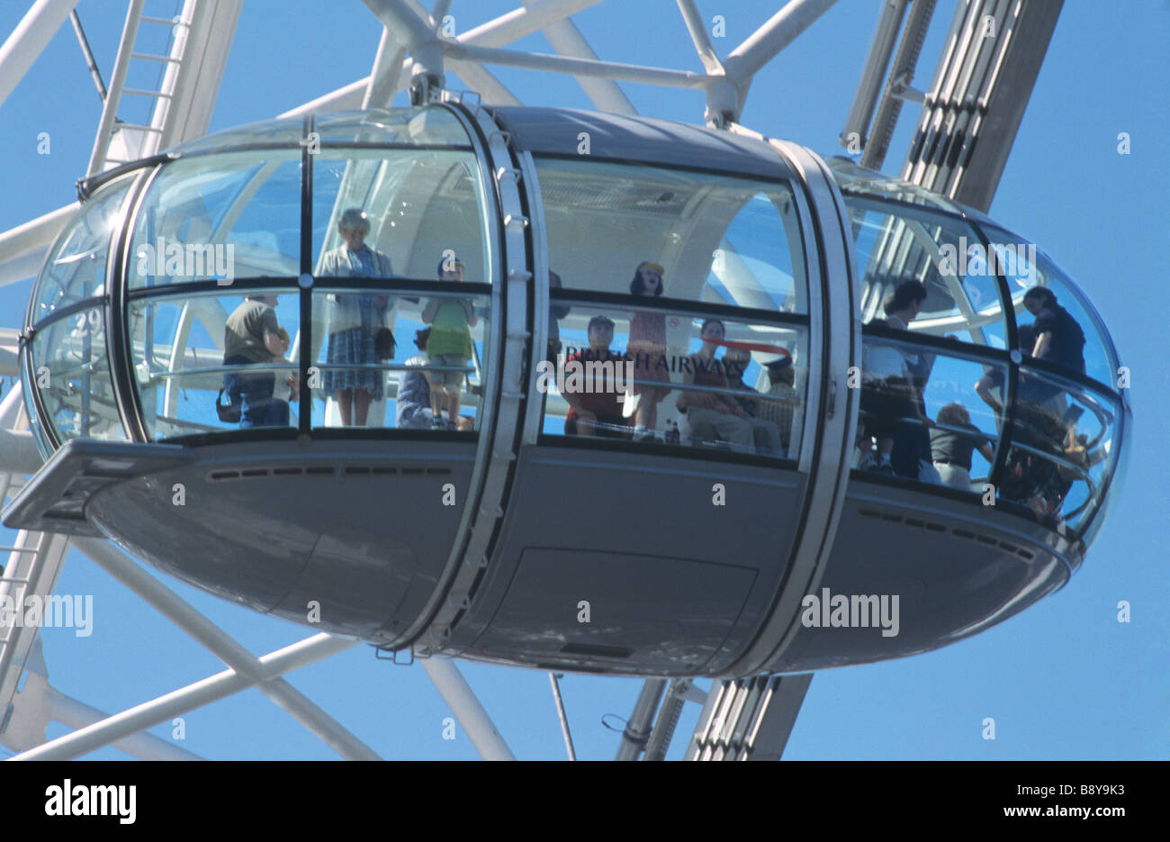 GB LONDON EYE PEOPLE IN POD Stock Photo - Alamy