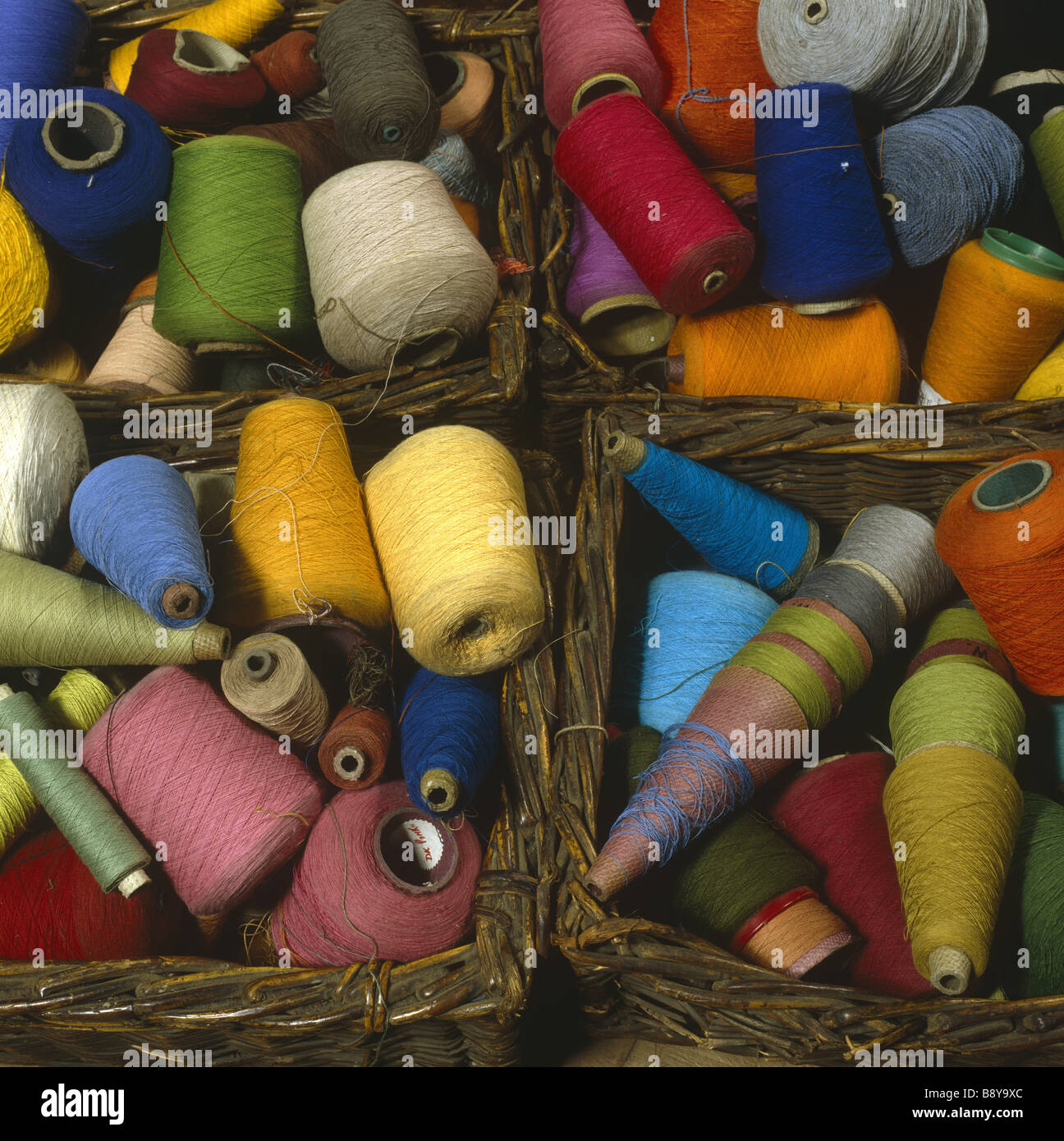 Colourful cotton reels in baskets Stock Photo - Alamy
