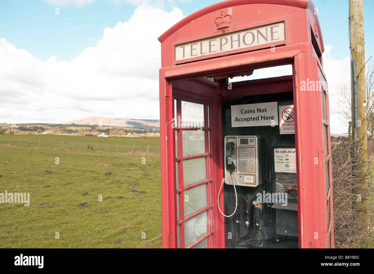 Red phone box in rural setting Stock Photo - Alamy