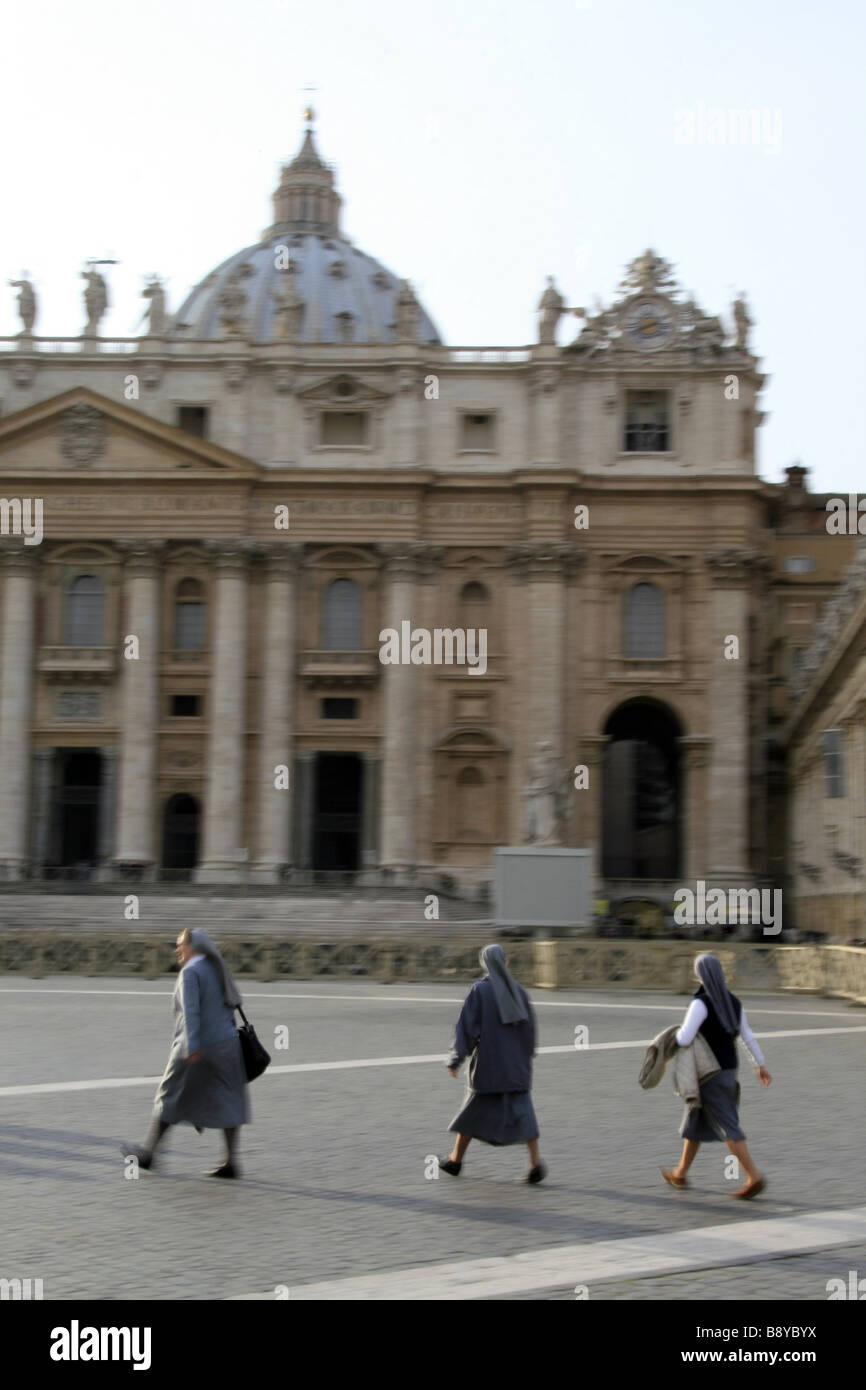 three nuns walking in st peter's square in rome Stock Photo - Alamy