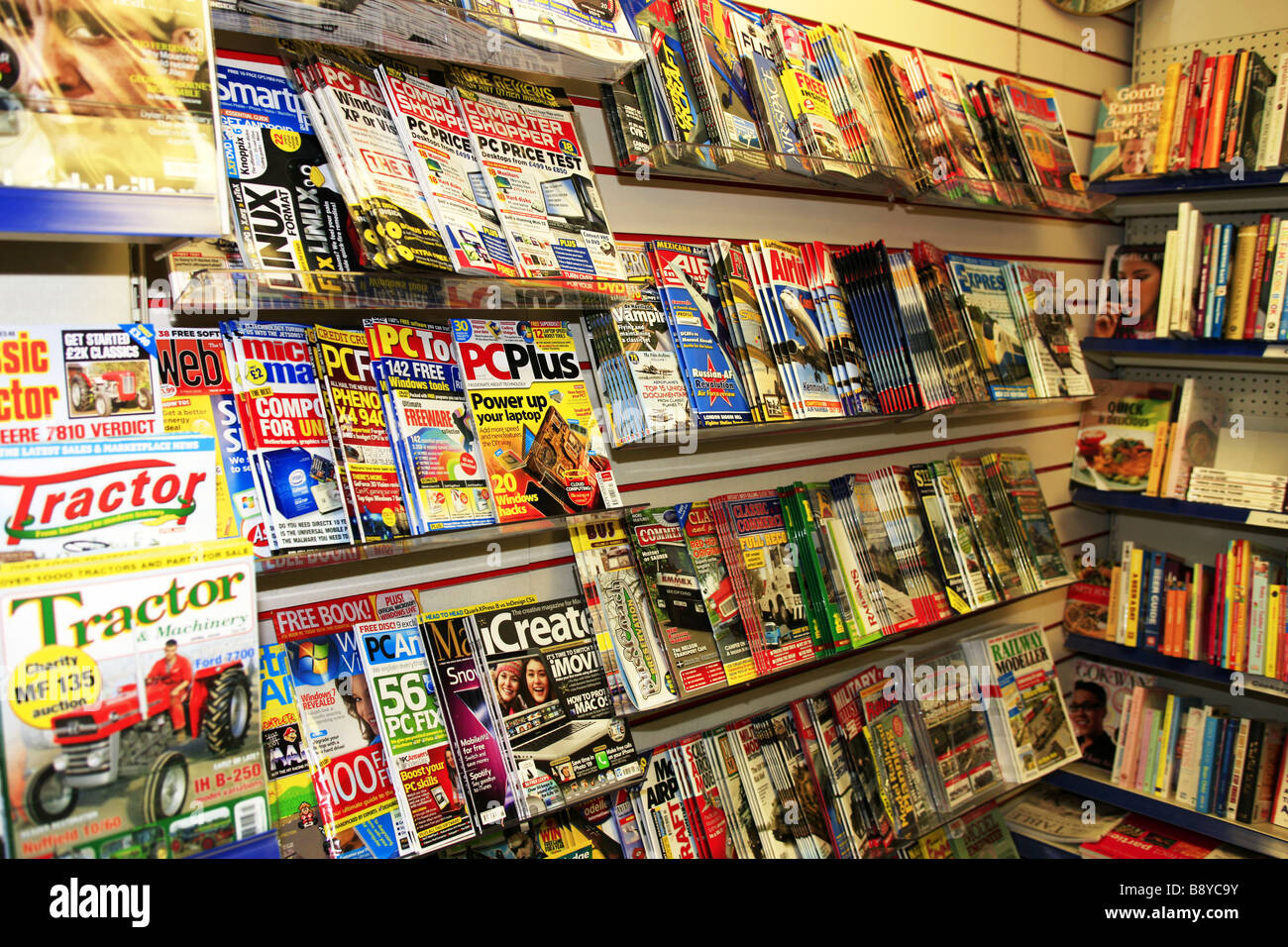 Monthly and weekly Magazines for sale on view at a store Stock Photo ...
