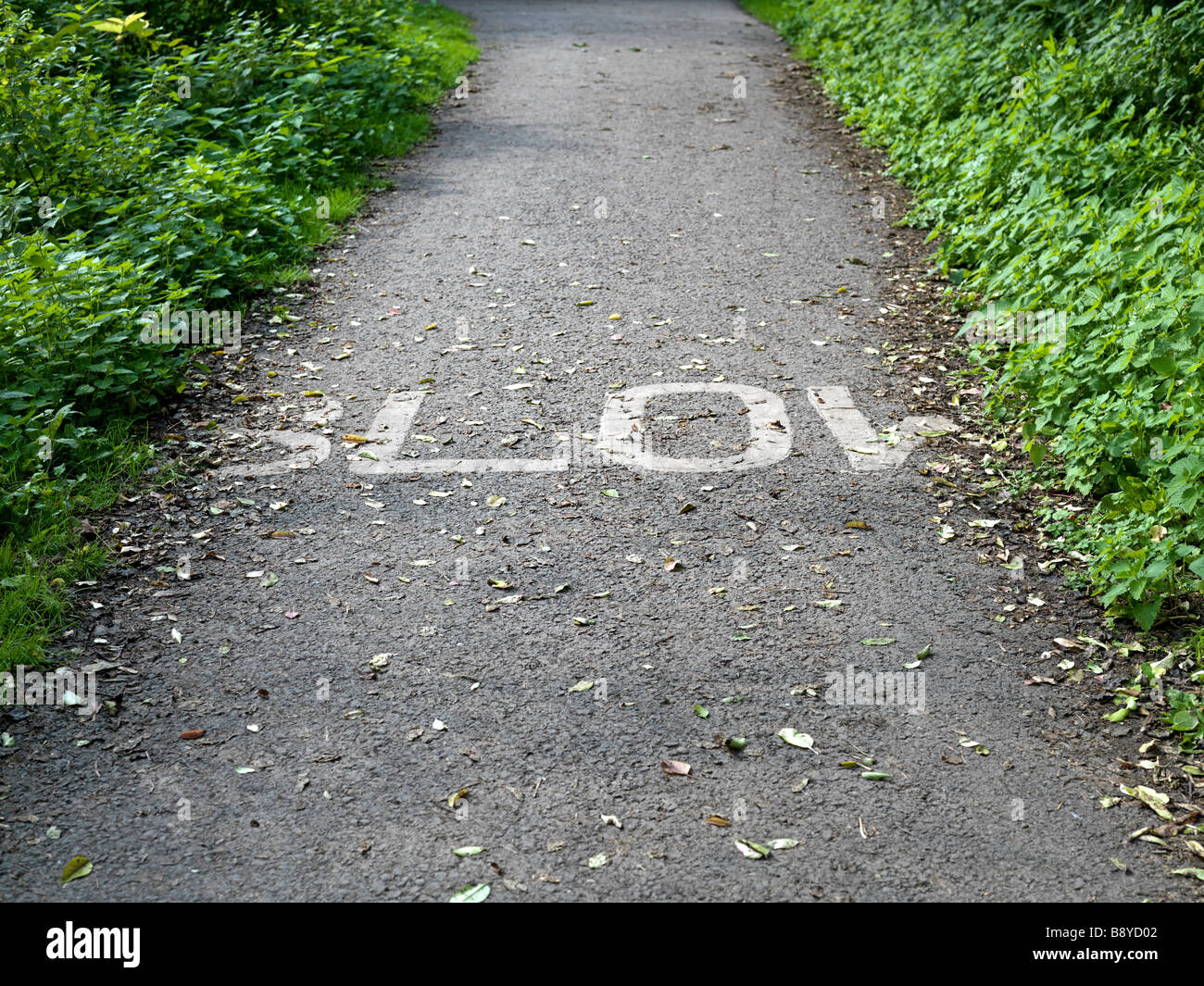 slow warning on road Stock Photo - Alamy