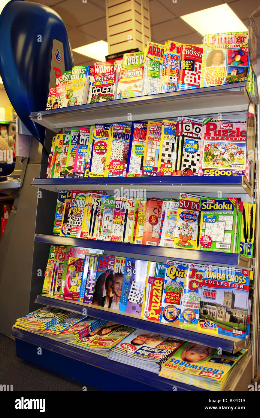 Monthly and weekly Magazines for sale on view at a store Stock Photo ...