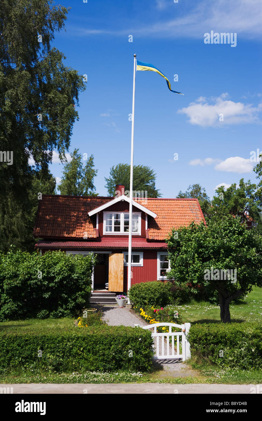 A red house Sweden Stock Photo - Alamy