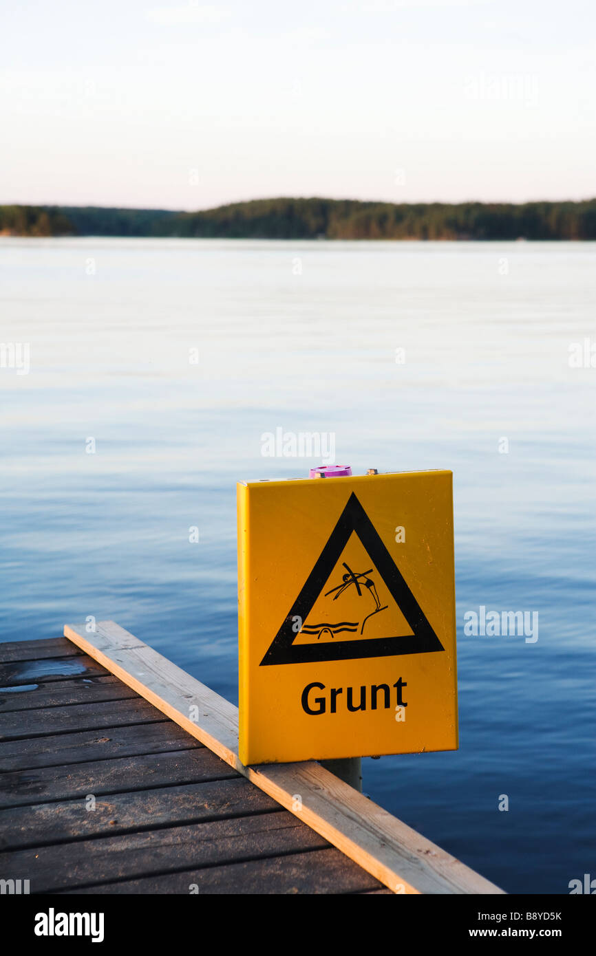 Sign warning people shallow hi-res stock photography and images - Alamy