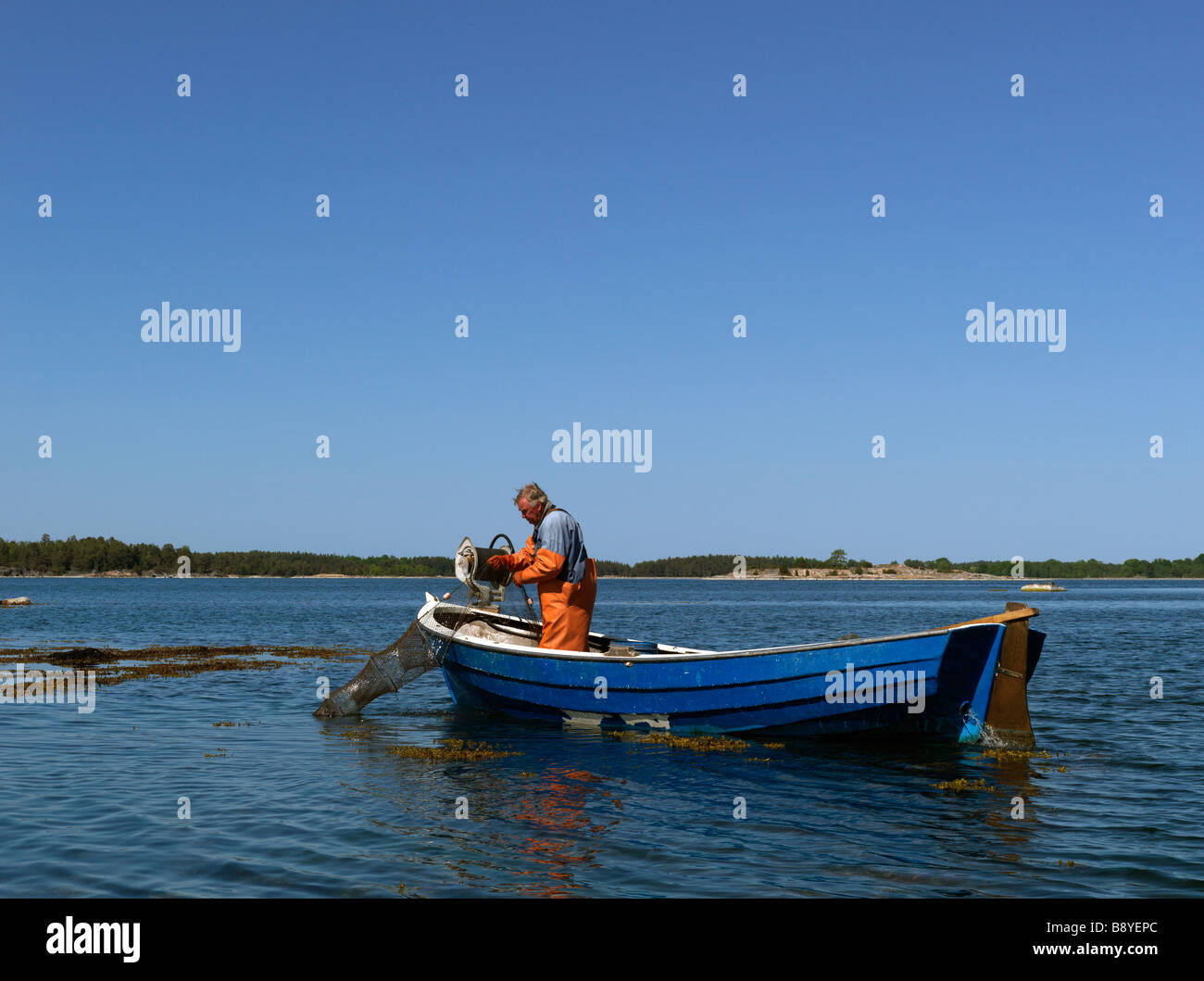 Old man in boat hi-res stock photography and images - Alamy