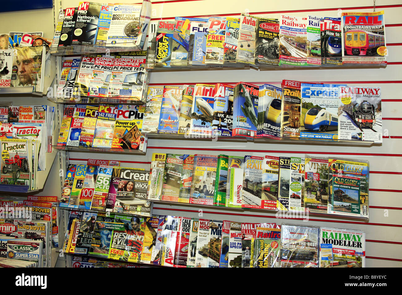 Monthly and weekly Magazines for sale on view at a store Stock Photo ...