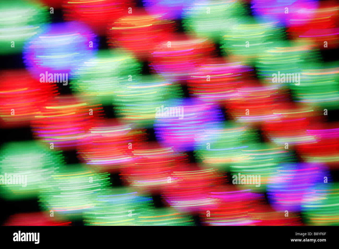abstract row of many multicoloured flashing colourful fairy lights ...