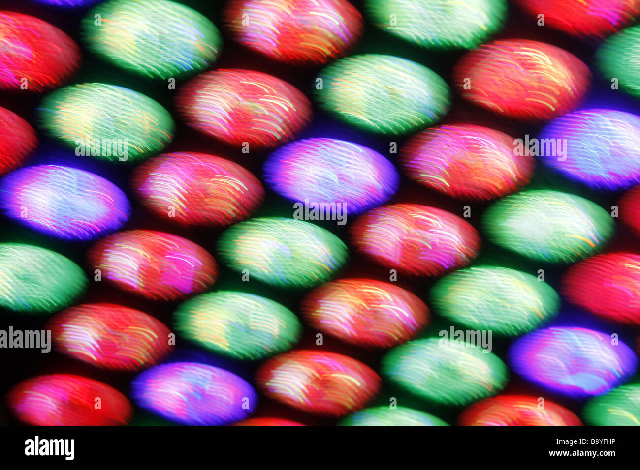 abstract row of many multicoloured flashing colourful fairy lights ...