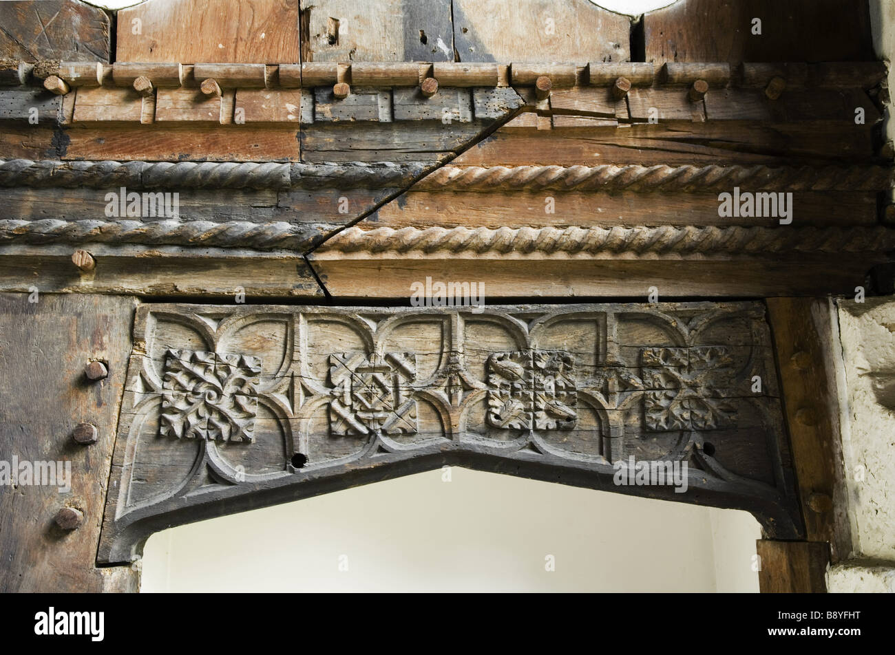C16th carved door head in the Screens Passage at Rufford Old Hall ...