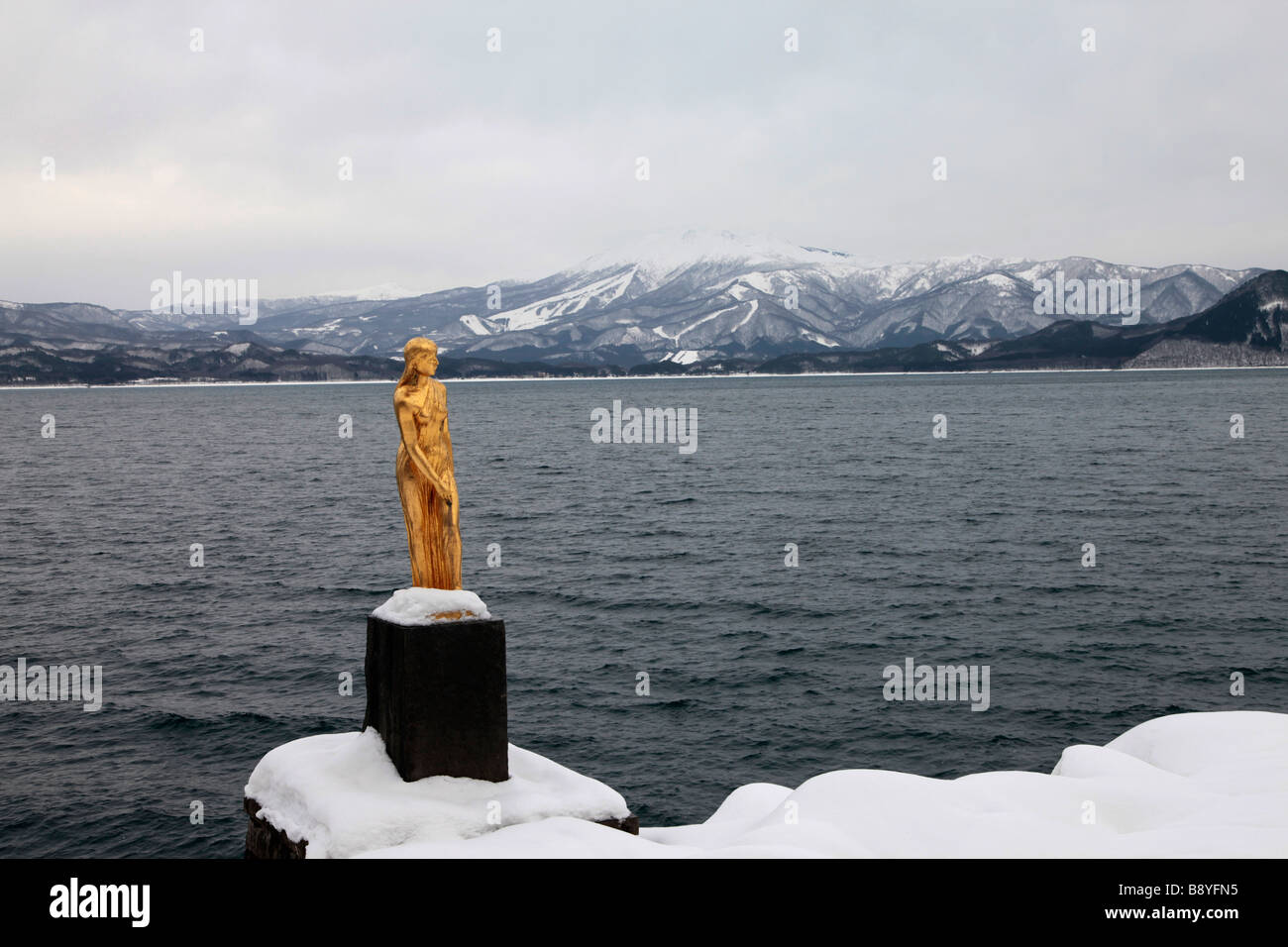 Tazawa ko Lake and Tatsuko statue in snow Akita prefecture Northern ...