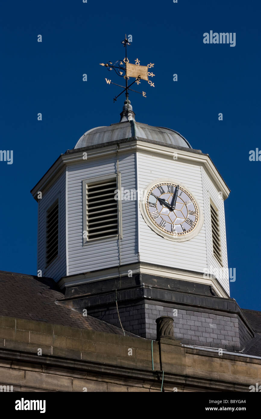 White clock tower and golden weather vane above the Guildhall Newcastle ...