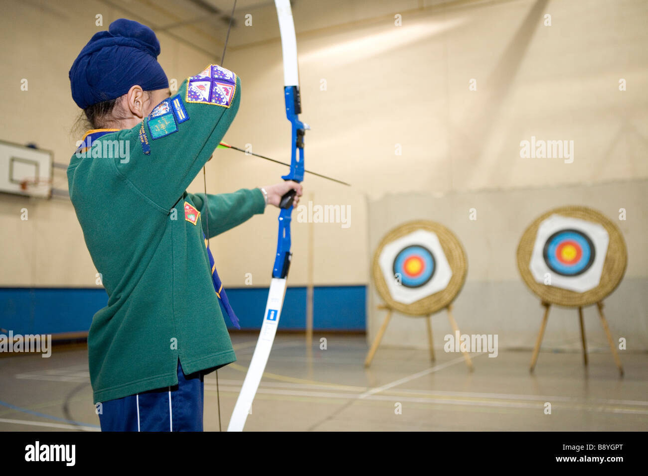 Boy practising archery Stock Photo - Alamy