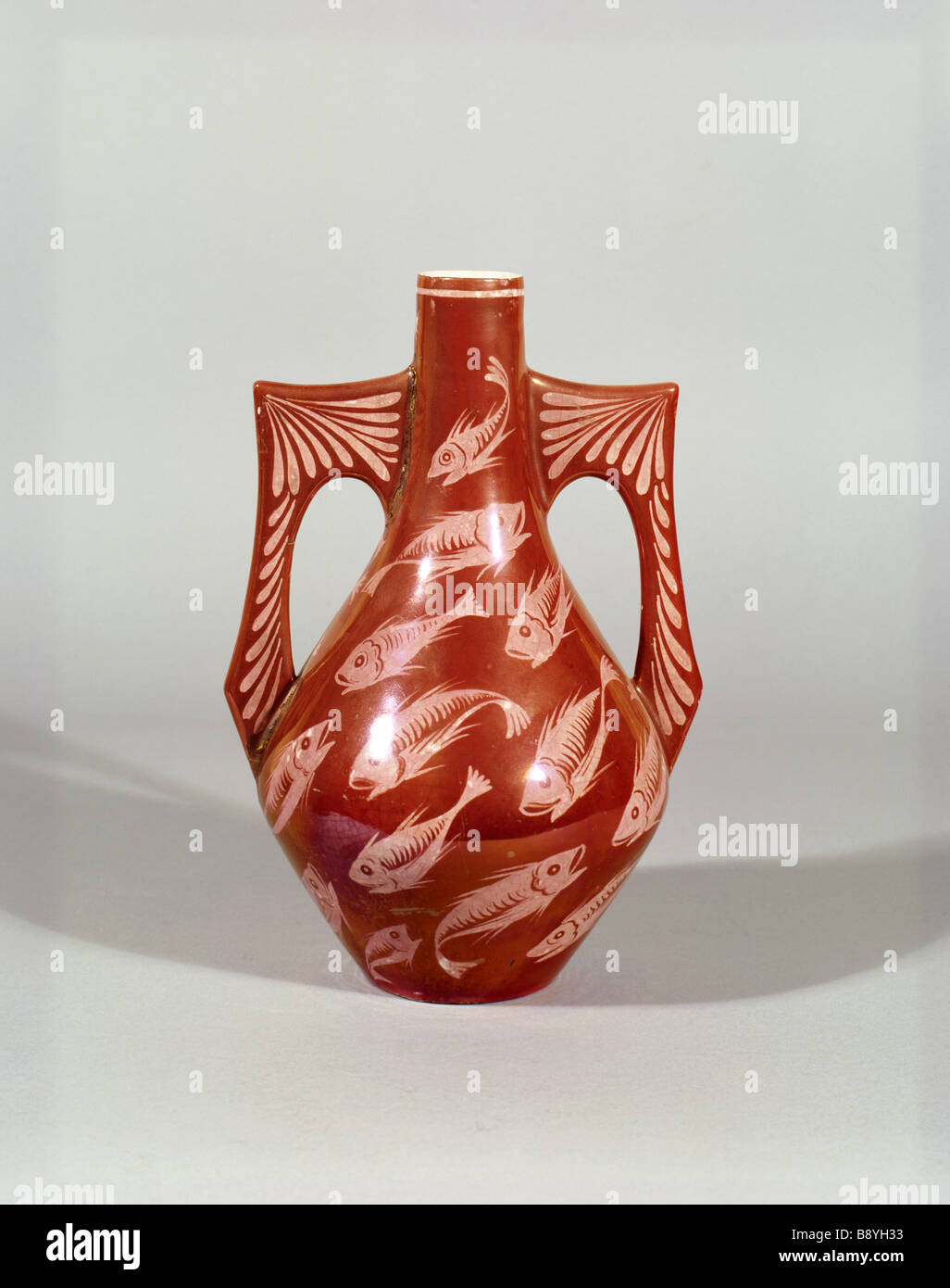 One of three red lustre vases in the hall by De Morgan fish design ...