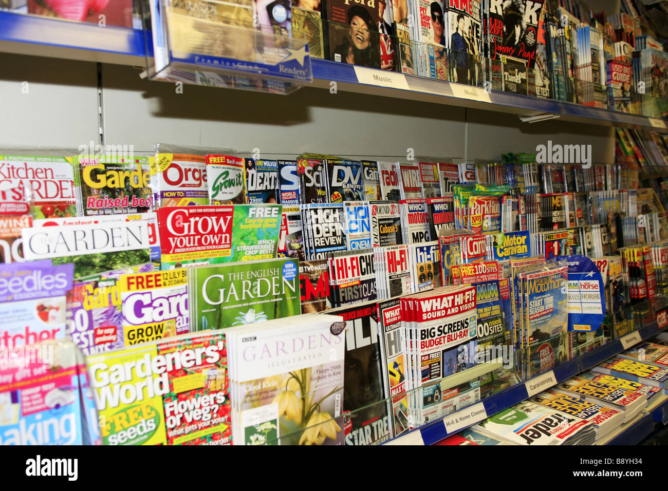 Monthly and weekly Magazines for sale on view at a store Stock Photo ...