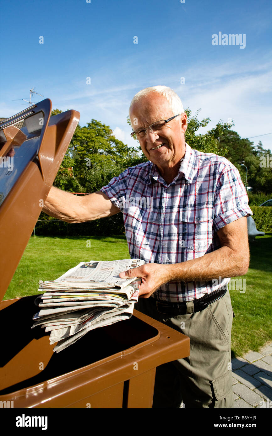 An elderly man by a dustbin Sweden Stock Photo - Alamy