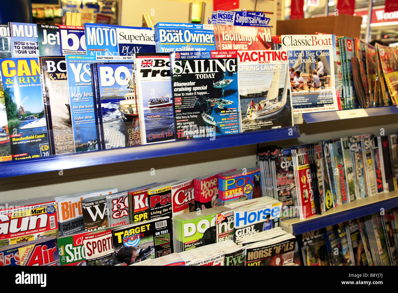 Monthly and weekly Magazines for sale on view at a store Stock Photo ...