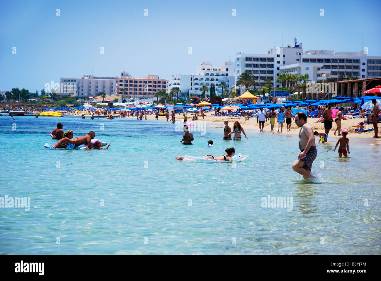 Beach life in Protaras Fig Tree Bay Cyprus Stock Photo - Alamy