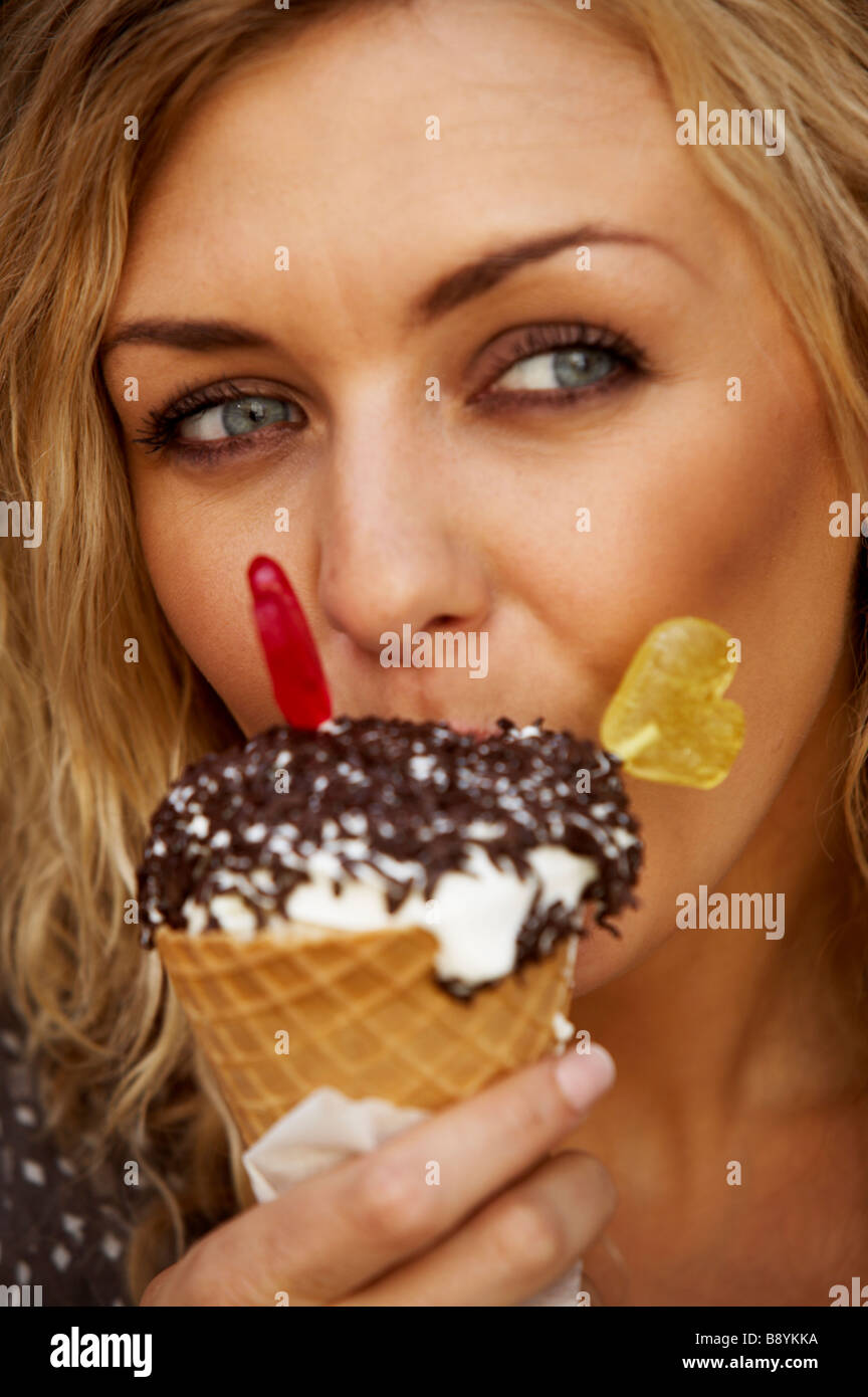 Mature woman eats ice cream hi-res stock photography and images - Alamy