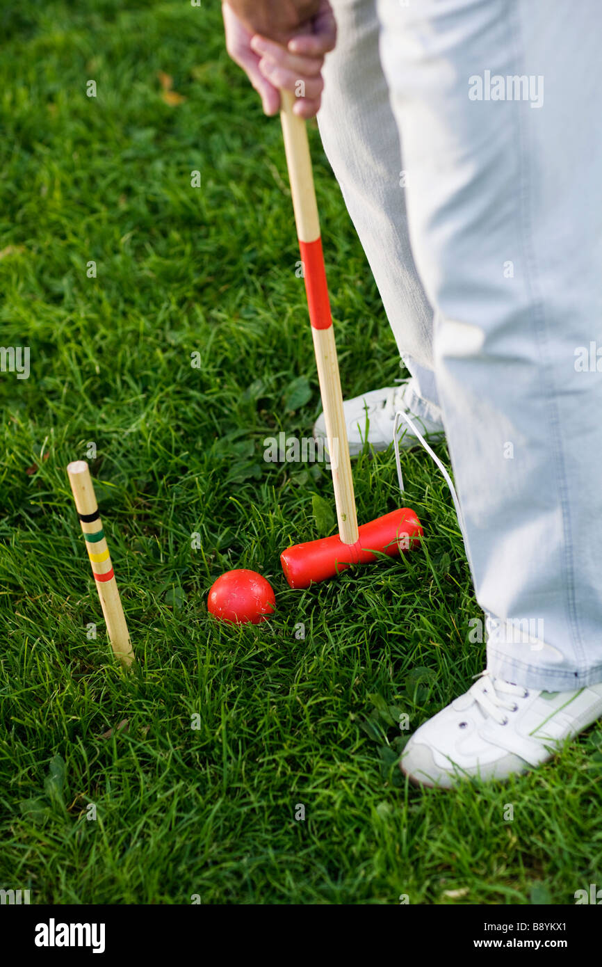 Man playing croquet Sweden Stock Photo - Alamy
