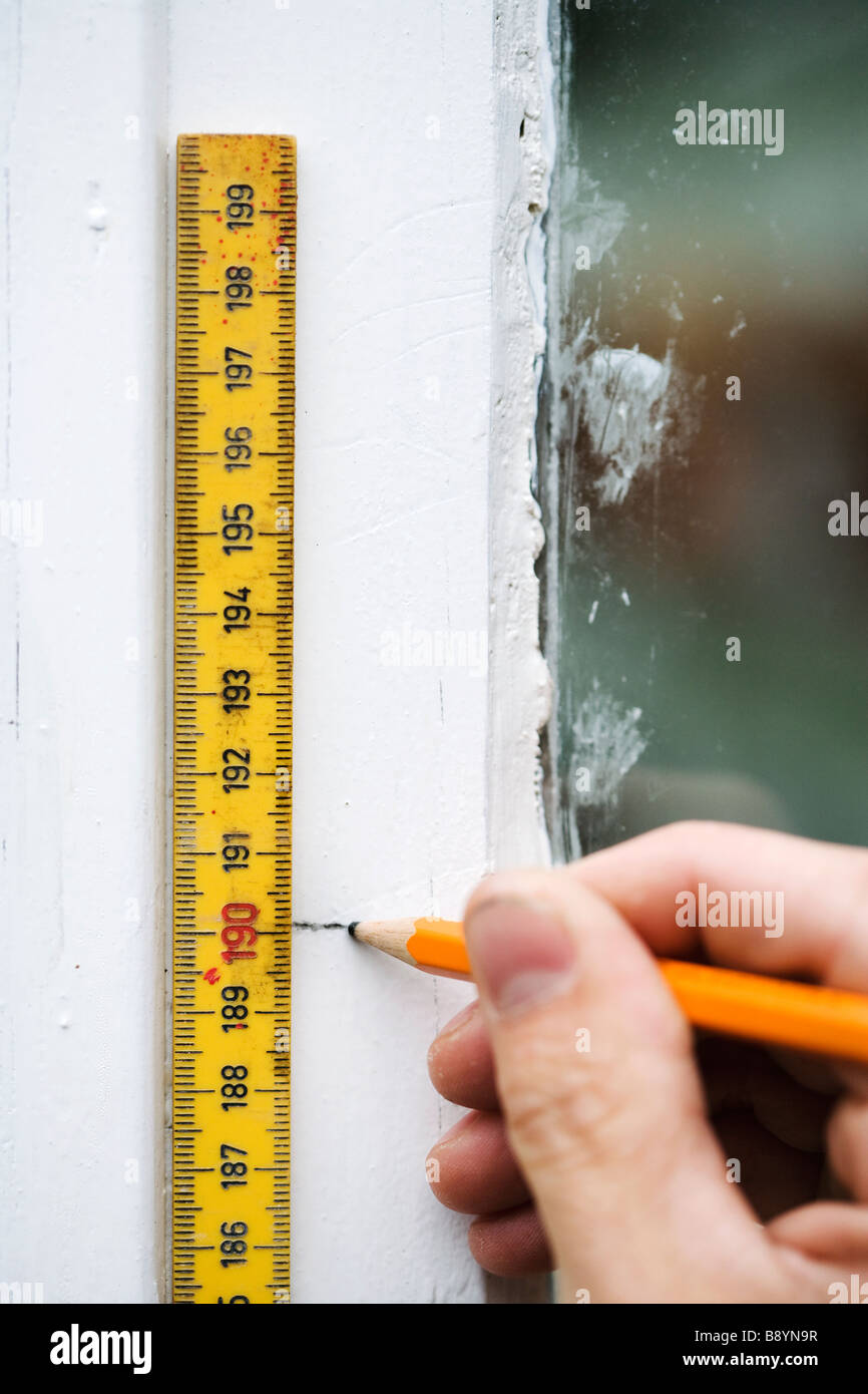 Using folding rule hi-res stock photography and images - Alamy