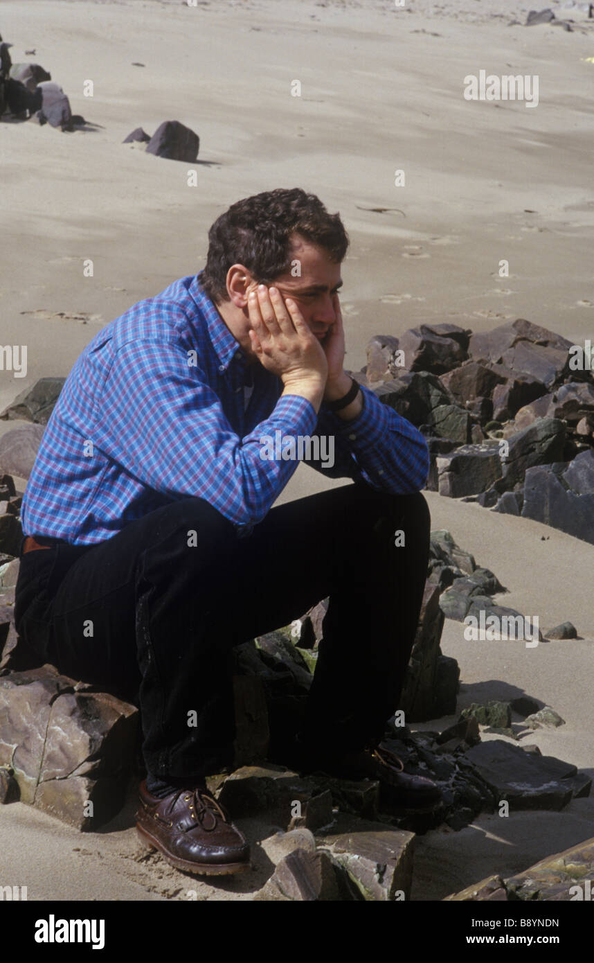 Sad beaches hi-res stock photography and images - Alamy