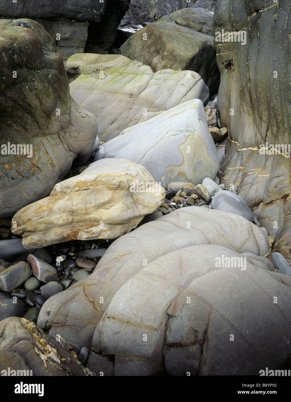 Large rocks and pebbles in Sandy Mouth Cornwall Colourful patterns ...