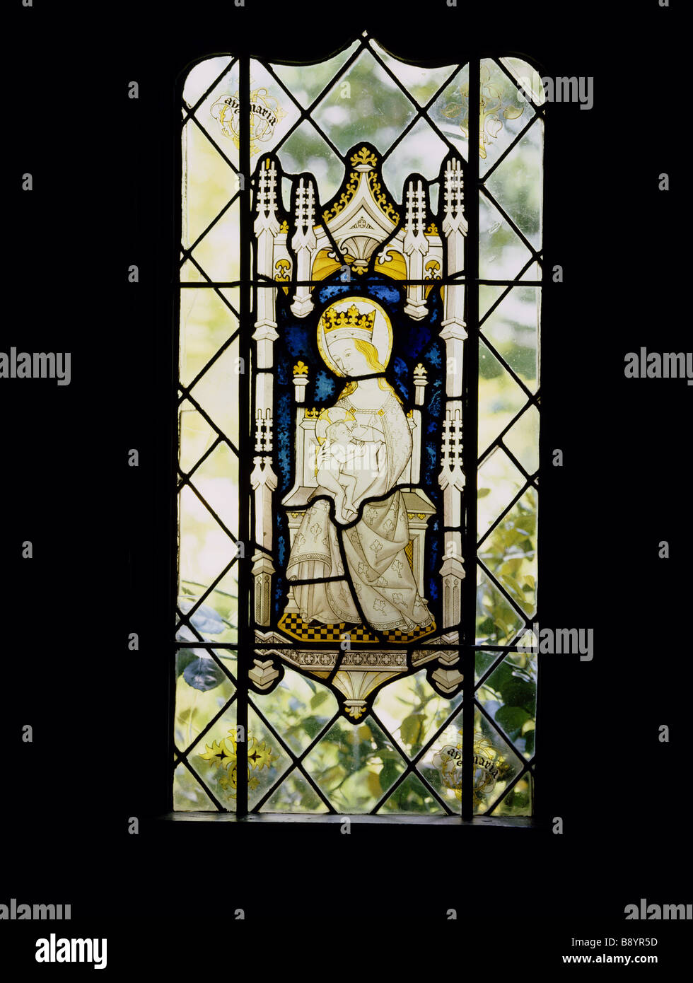 Medieval stained glass of Madonna Child in a Canopy in a window in the ...