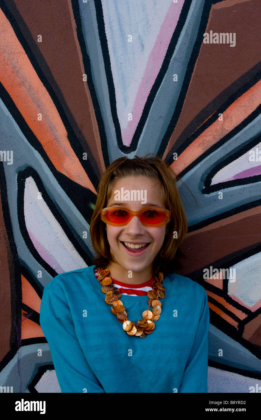 cool girl orange sunglasses grafitti portrait Stock Photo - Alamy