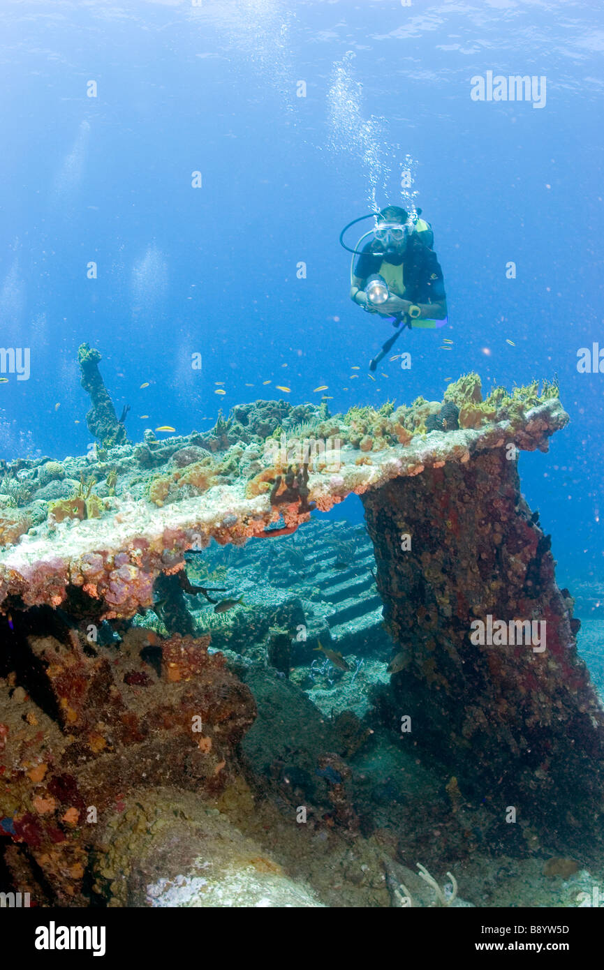 Scuba diving at the wreckage of the RMS Rhone in the waters of the ...