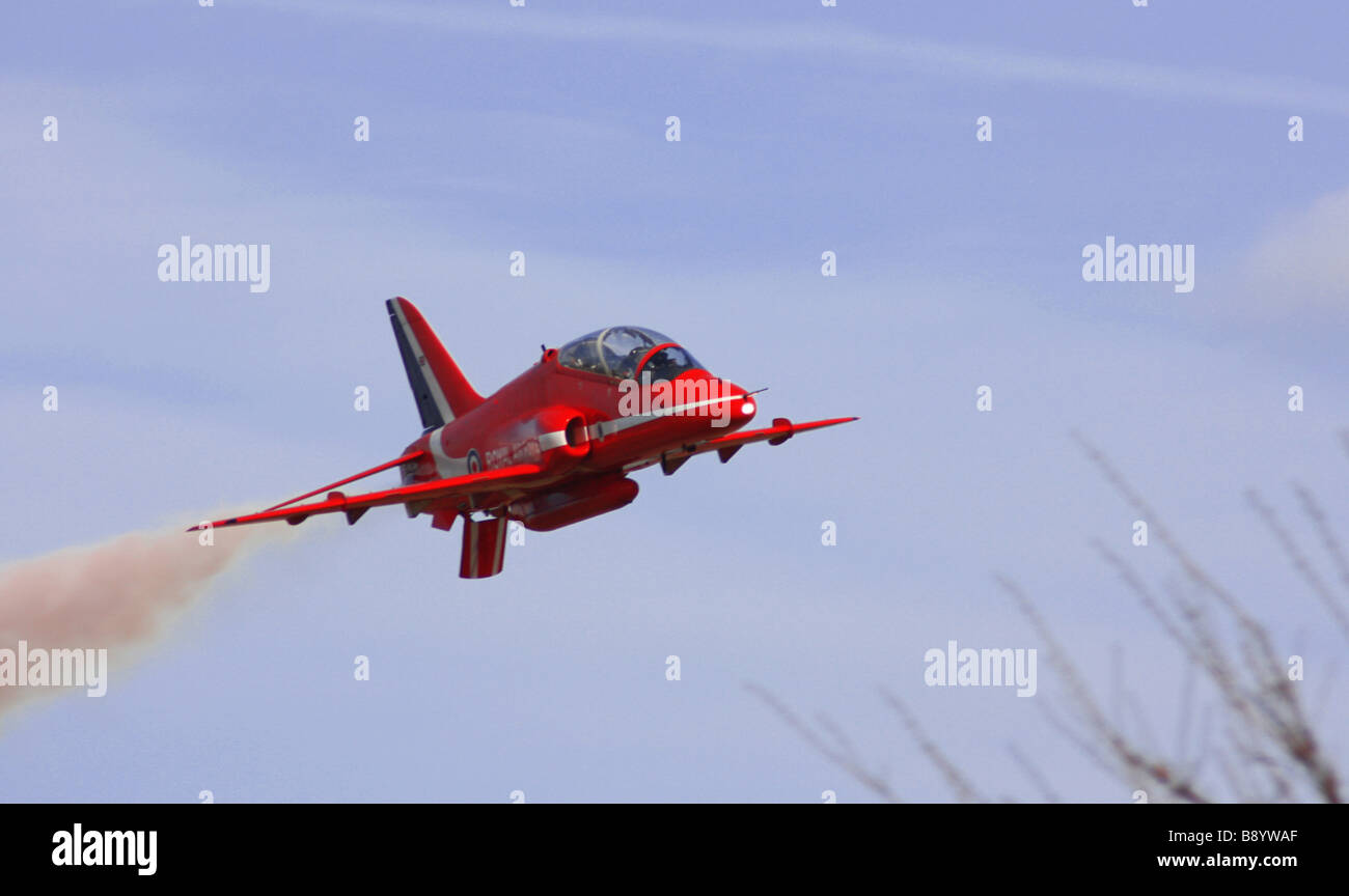 Red Arrow performing a low flypast Stock Photo - Alamy