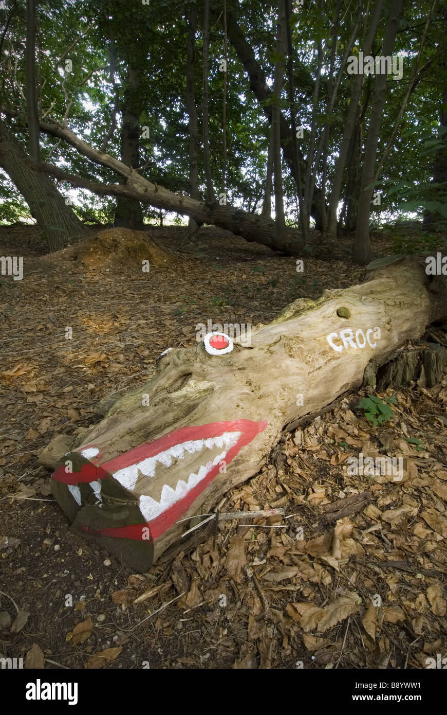 Painted tree trunks in the Chestnut Walk around the site at Sutton Hoo ...