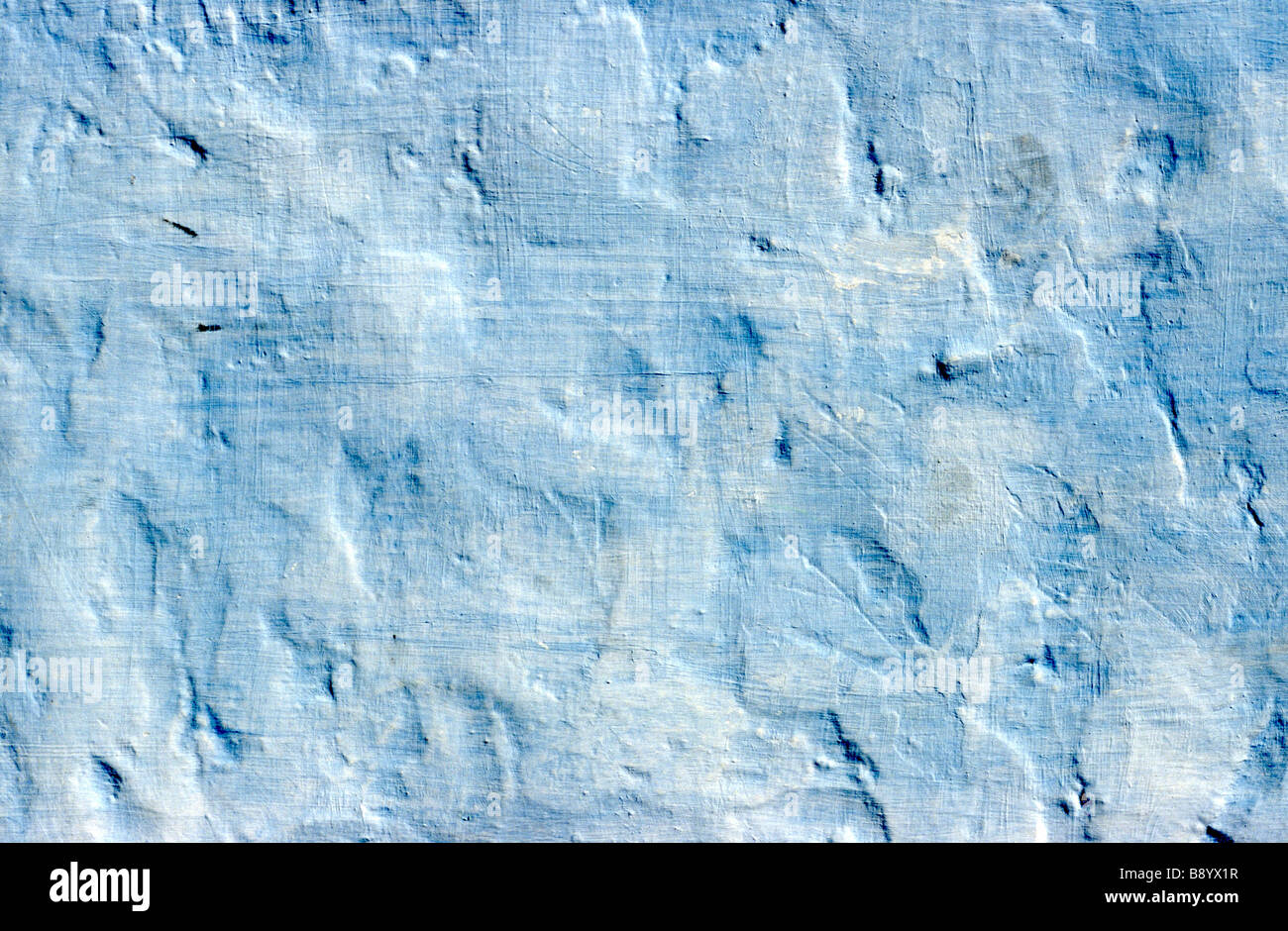 fresh shade of blue rough plastered wall Stock Photo - Alamy