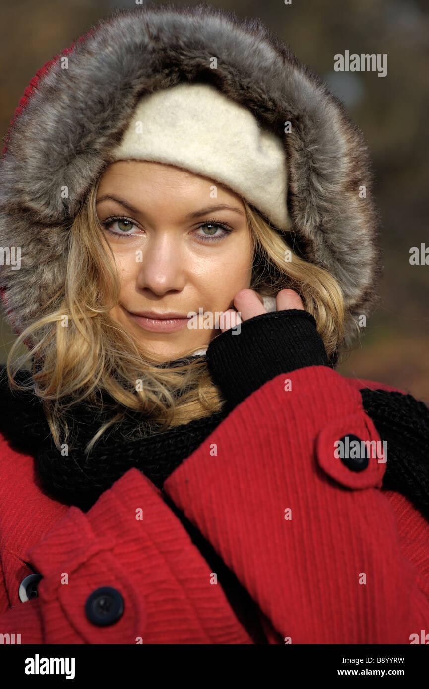 Beautiful Woman keeping herself warm Stock Photo - Alamy