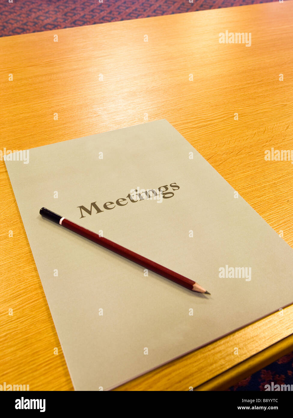 OFFICE DESK WITH PAPER AND PENCIL READY FOR MEETING Stock Photo - Alamy