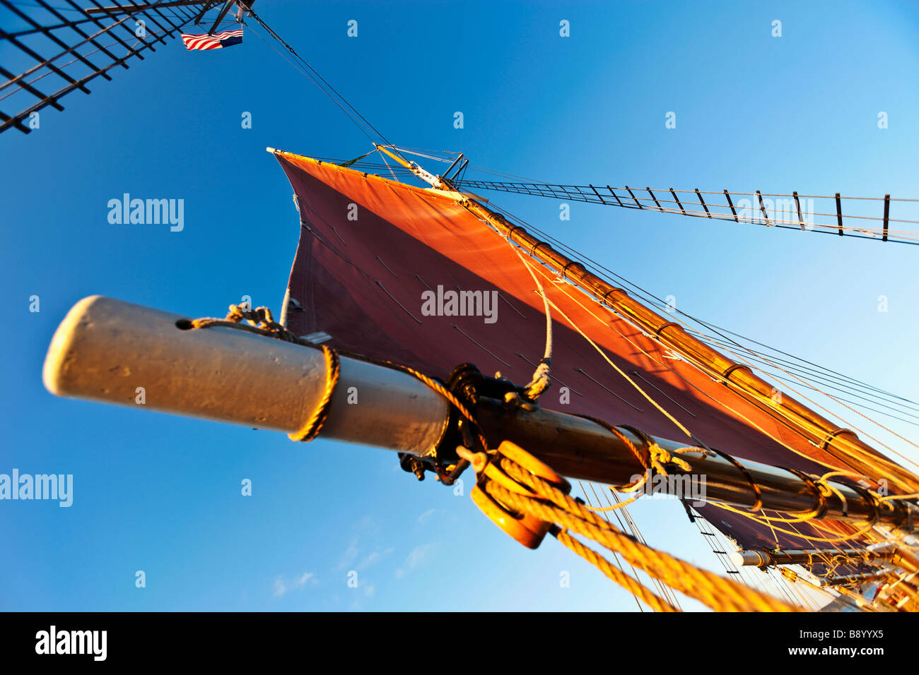Low angle view of mast and sails on a sailboat Stock Photo - Alamy